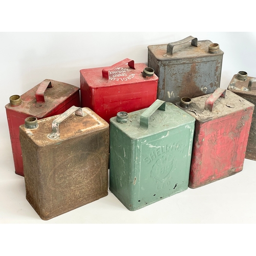A quantity of vintage petrol cans. Including 2 Esso and 2 Shell.