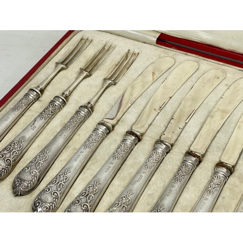 A 12 piece silver fish cutlery set in case. Stamped TB&S. 1933 ...