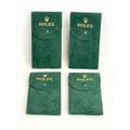 4 Rolex watch cases.
