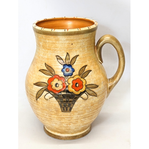 A large Charlotte Rhead pottery jug for Crown Ducal. 26cm