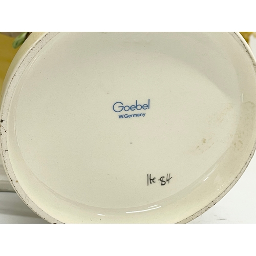 An M.J Hummel Goebel pottery lamp. Base measures 22cm