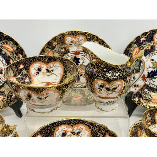 A 21 piece Royal Crown Derby Imari tea set. Circa 1937. Pattern number ...