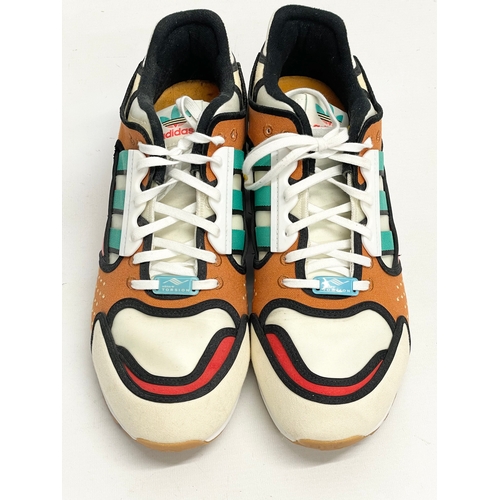 A pair of Adidas Originals, The Simpsons, ZX 1000, "Krusty Burger ...