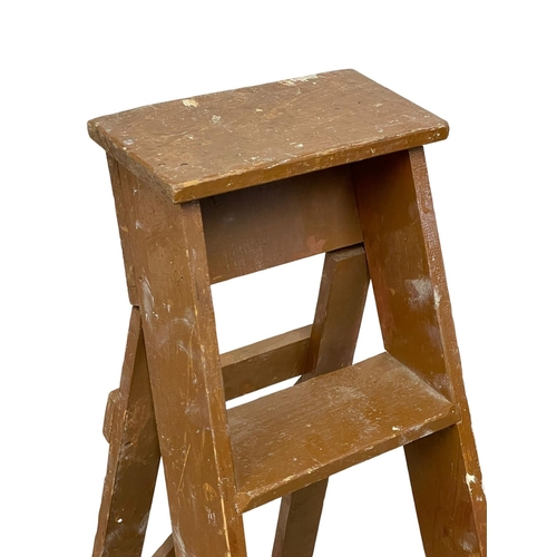 A vintage wooden step ladder