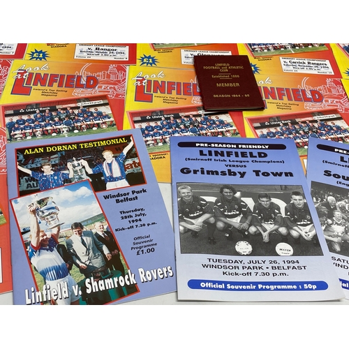 A collection of Linfield Football Programmes with folder. 1994-1995 ...