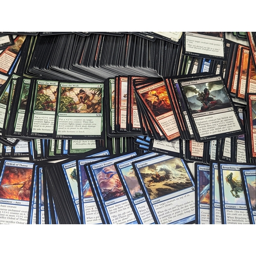 A large collection of Magic The Gathering playing cards.