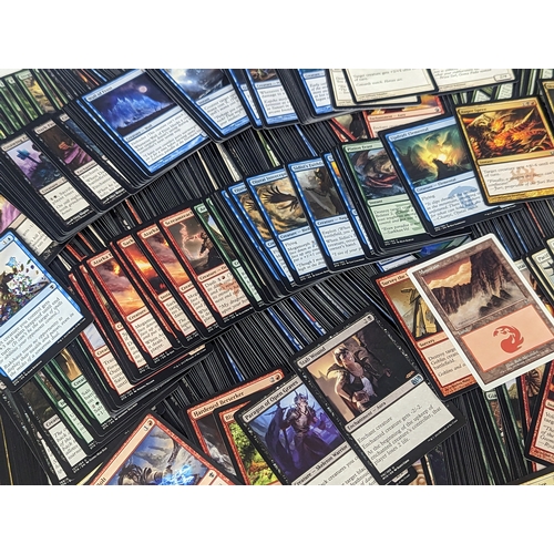 A large collection of Magic The Gathering playing cards.