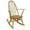 An Ercol Blonde Elm Mid Century rocking chair. Model 428.
