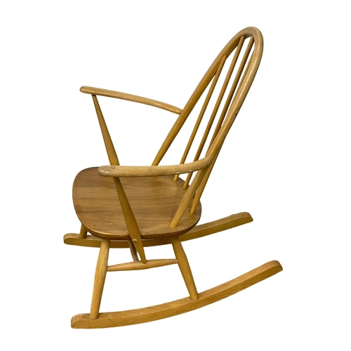 An Ercol Blonde Elm Mid Century rocking chair. Model 428.