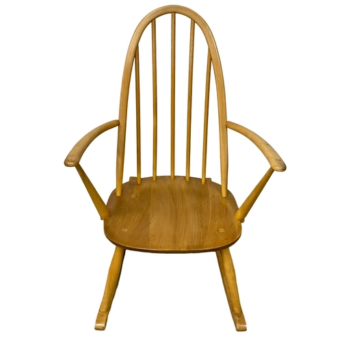An Ercol Blonde Elm Mid Century rocking chair. Model 428.