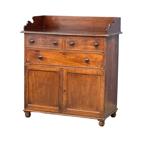 A good quality George IV mahogany gallery back side cabinet with 3 ...