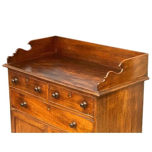 A good quality George IV mahogany gallery back side cabinet with 3 ...