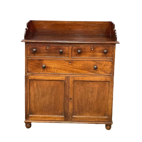 A good quality George IV mahogany gallery back side cabinet with 3 ...