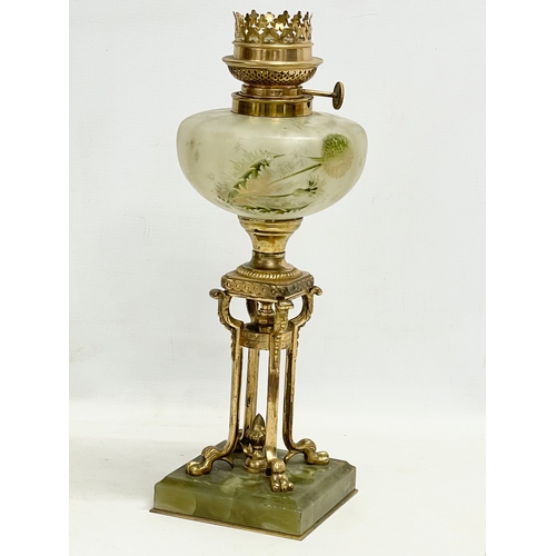 A vintage ornate brass and onyx oil lamp. 38cm