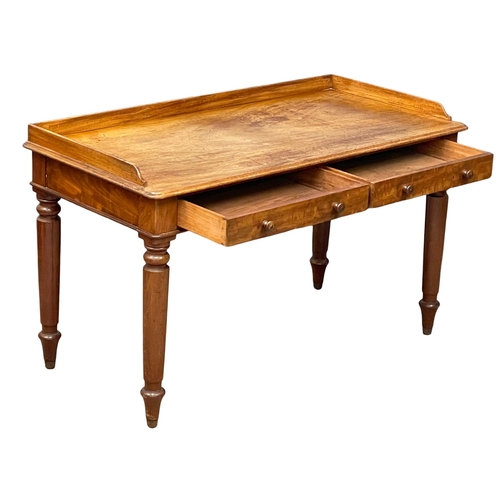 A Victorian mahogany gallery back side table with 2 drawers. 122x60x73.5cm