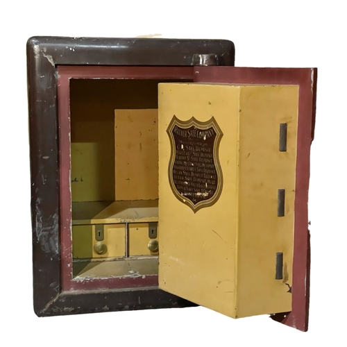 An Edwardian period Fire Resistant safe. Ratner, London. With keys ...