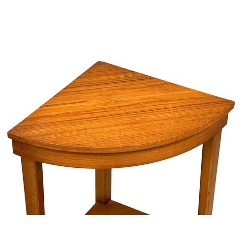 A Mid Century teak corner side table by Legate Furniture. 53x37x72cm(2)