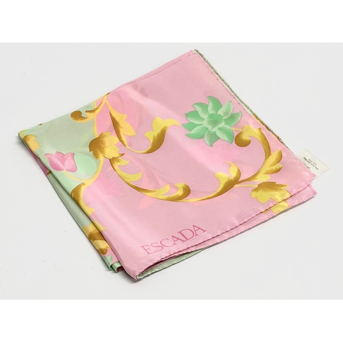 11 Escada silk scarves.