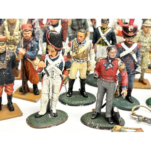 A collection of metal Del Prado model soldiers.