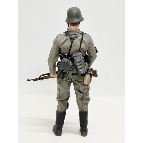 A Dragon Models LTD WWII German Infantry model soldier. 30cm.