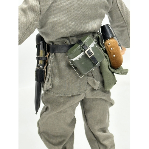 A Dragon Models LTD WWII German Infantry model solder. 31cm
