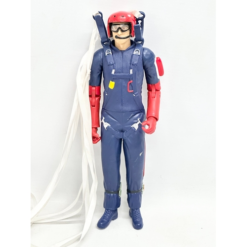 An HM Armed Forces parachute action figure. 25cm
