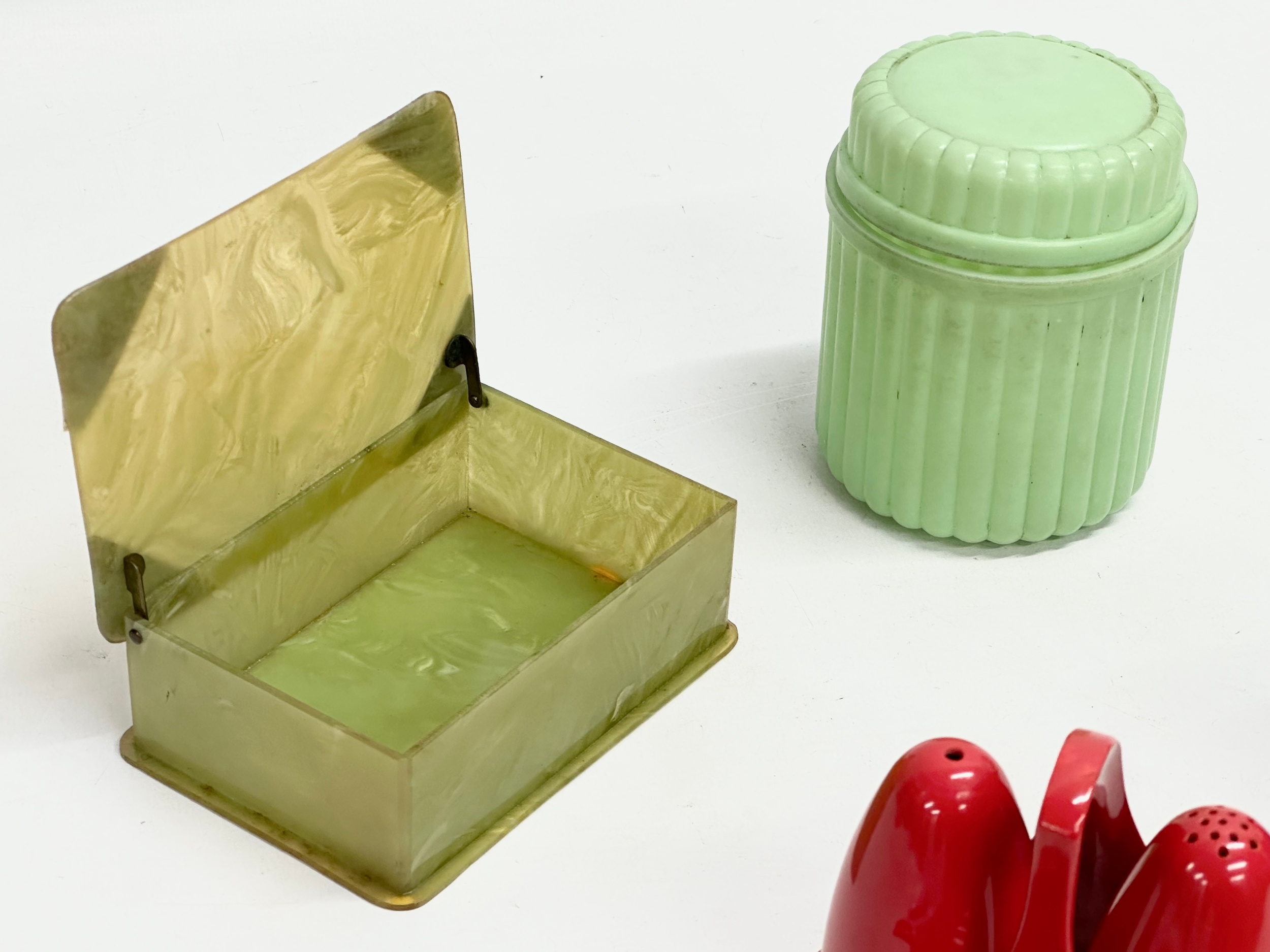 A collection of Bakelite. Melaware Melmex Melamine cruet set, A Bex ...