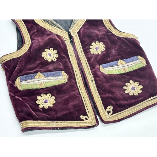 A vintage Middle Eastern embroidered vest.