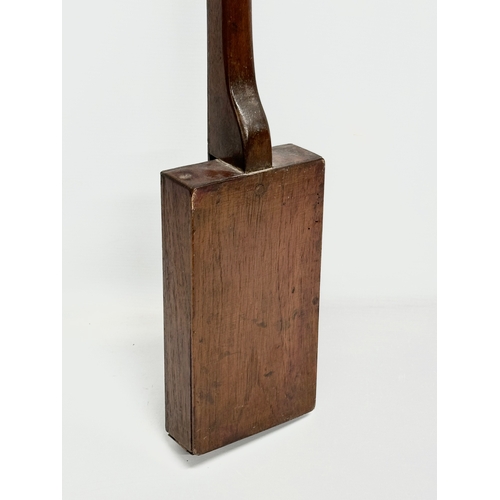An early 20th century handmade one string fiddle/guitar. 89cm