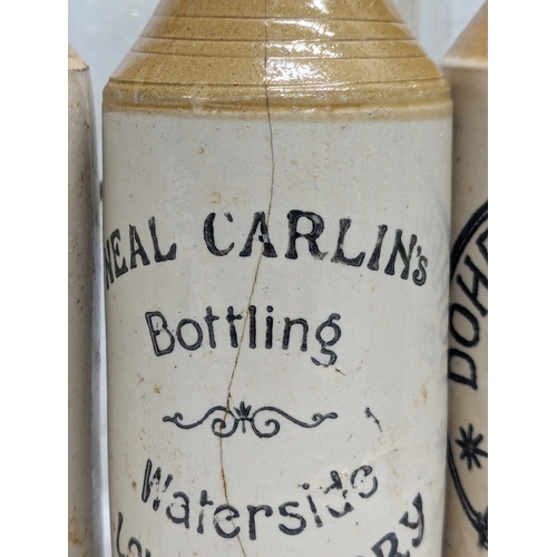 A collection of late 19th / early 20th century glass and stone bottles ...