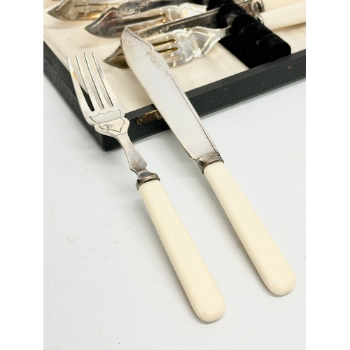 A set of early 20th century ornate silver plated cutlery in case by H ...