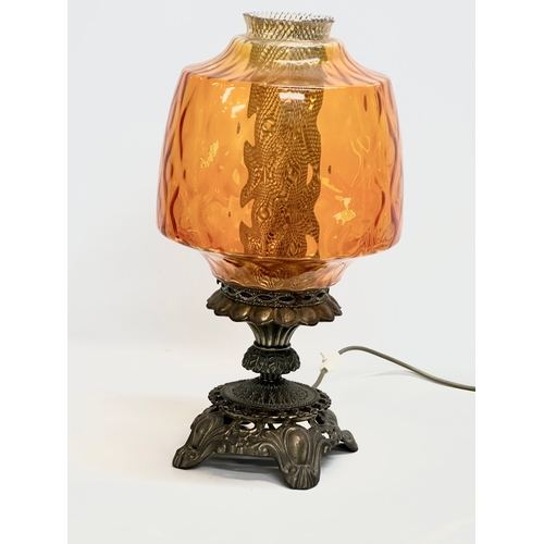 A large ornate brass Falkenstein table lamp. 51cm