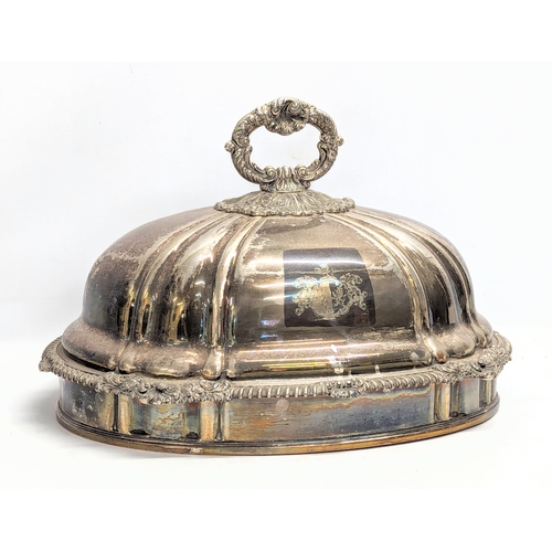 A Late 19th Century ornate silver plate food cover. 38x29x27cm