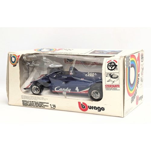 A Burago model Grand Prix racecar, Candy Tyrrell. 1/14 scale. Box ...