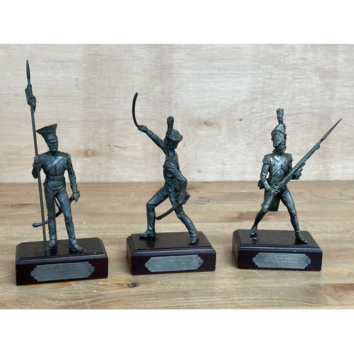 3 pewter soldiers on stands and a Girl Guides Association belt ...