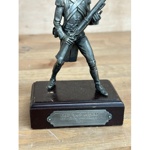 3 pewter soldiers on stands and a Girl Guides Association belt ...