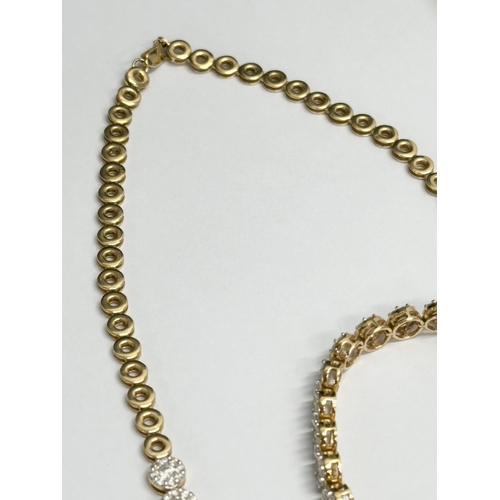 An excellent quality 18ct yellow gold and diamond set. Necklace ...