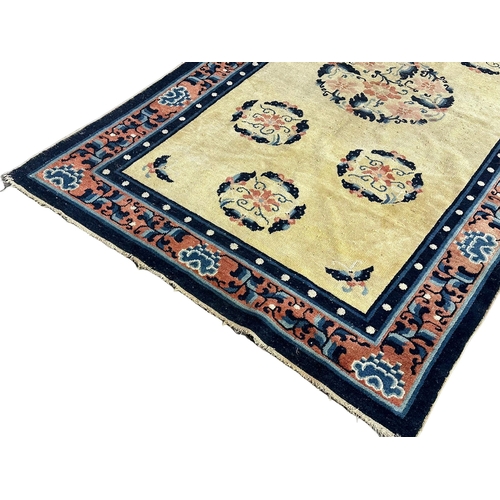 A vintage Middle Eastern hand knotted rug. 133x228cm
