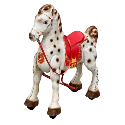 A 1950’s Mobo Bronco mechanical child’s horse.