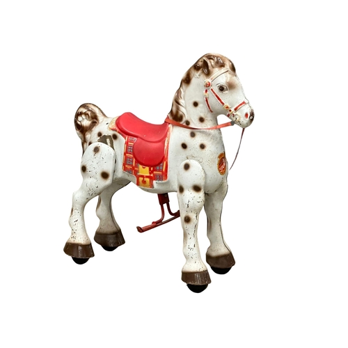 A 1950’s Mobo Bronco mechanical child’s horse.