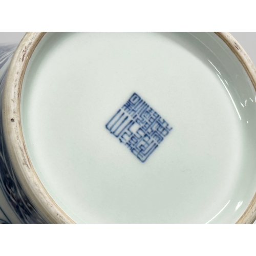 A 20th Century Chinese blue and white vase. Qianlong impressed mark ...