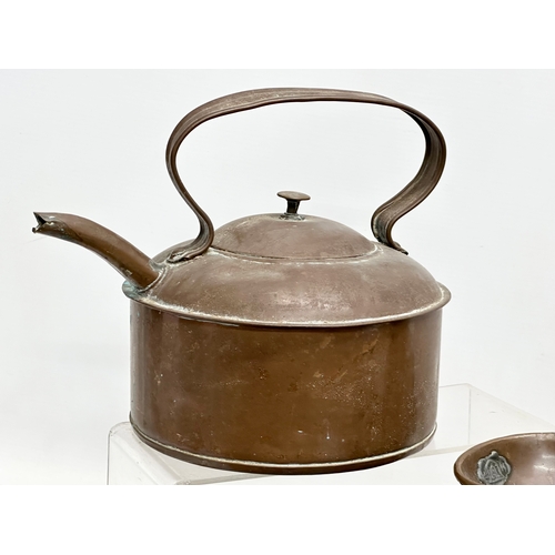 A collection of Late 19th Century copper measures and kettles. Imperial ...