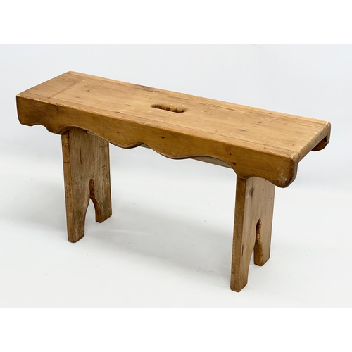 2 vintage pine stools.