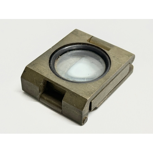 A Scottish brass thread counter magnifying glass.