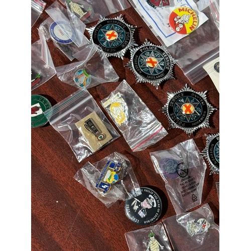 A collection of badges.