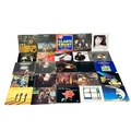 A collection of LP, vinyl records. ABBA, Michael Jackson, Queen etc
