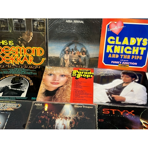 A collection of LP, vinyl records. ABBA, Michael Jackson, Queen etc