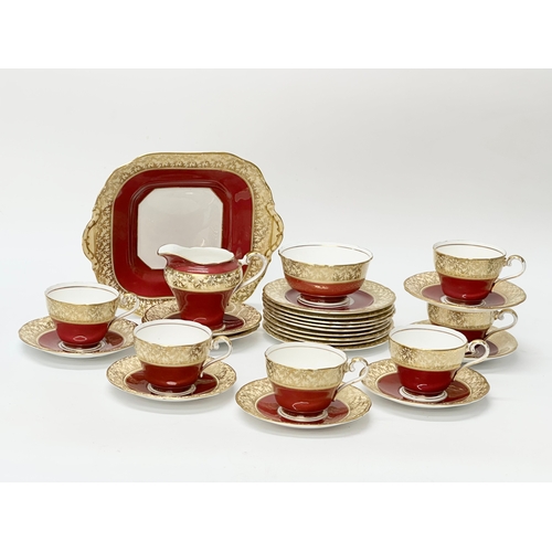 An Aynsley Fine Bone China tea service. Pattern 163 Burgundy & Gold ...