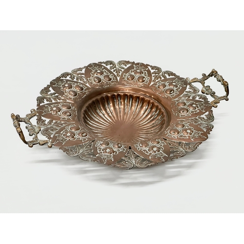 A pierced copper inset tray. Late 19th Century. Embossed flowers and ...