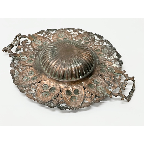 A pierced copper inset tray. Late 19th Century. Embossed flowers and ...